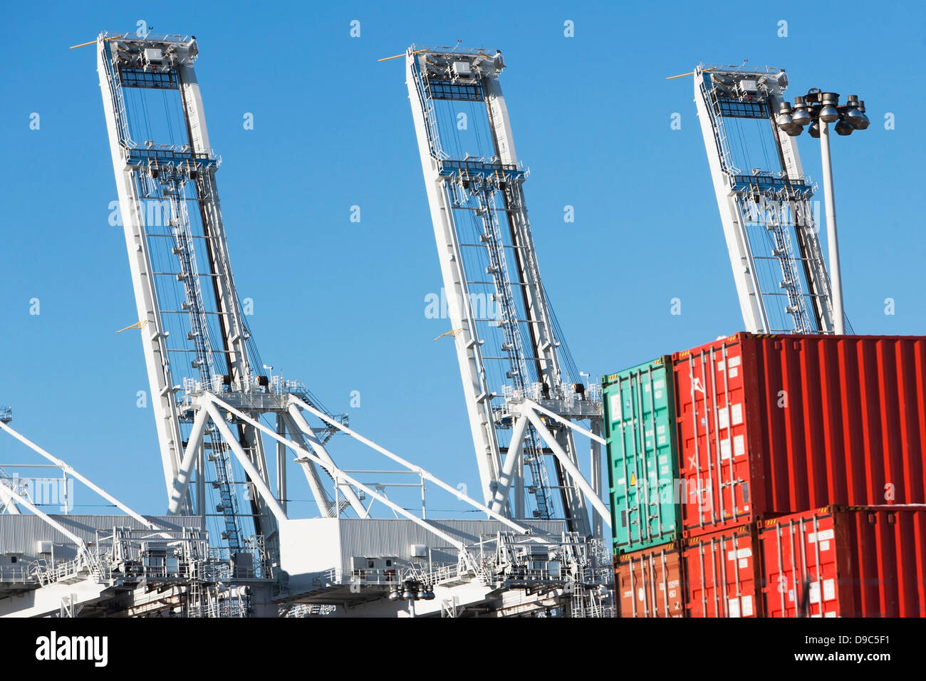 Cargo containers lift lifting cranes crane hi-res stock photography and ...