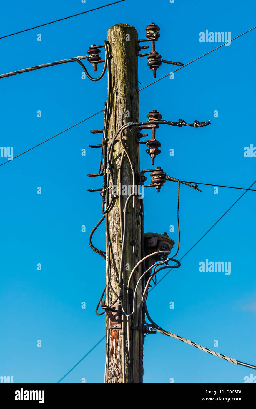 Old rustic wooden telegraph post Stock Photo - Alamy