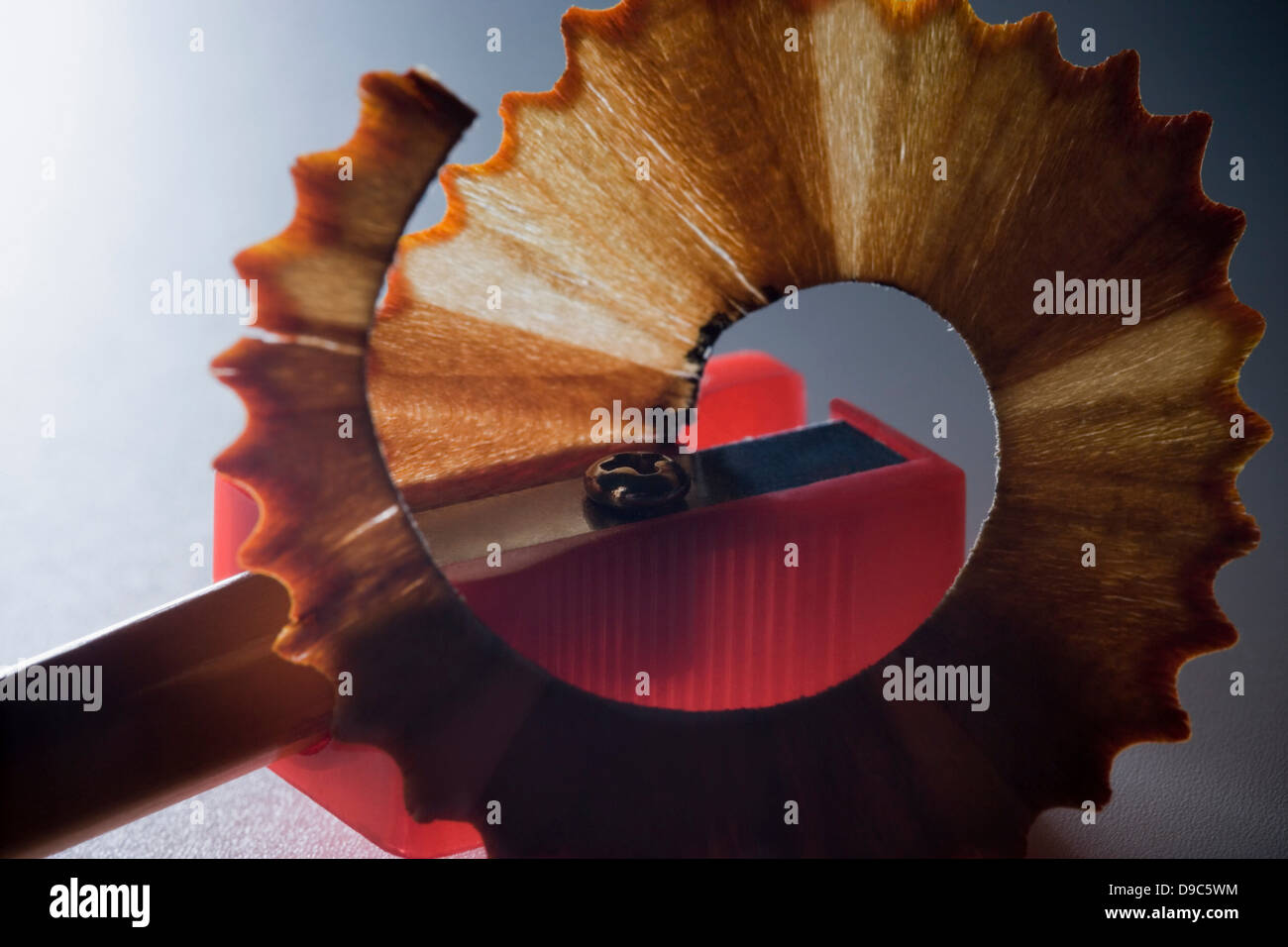 Pencil being sharpened with pencil sharpener Stock Photo - Alamy