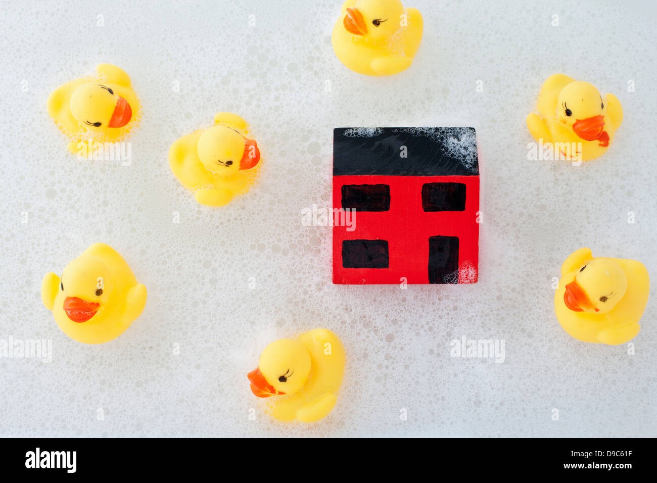 Model house and rubber ducks in bath Stock Photo - Alamy