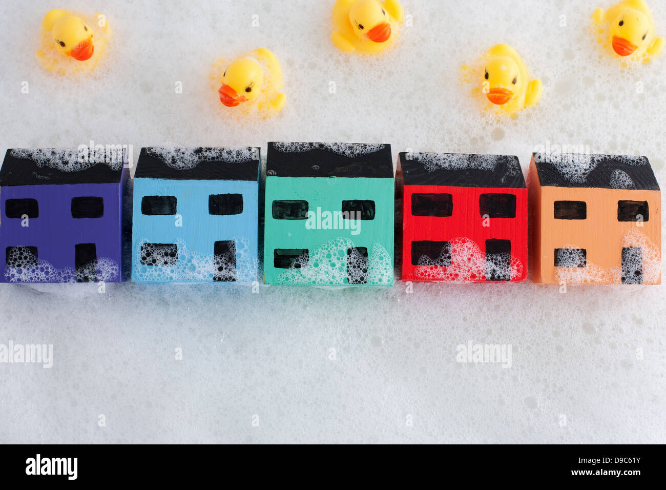 Model houses and rubber ducks in bath Stock Photo - Alamy