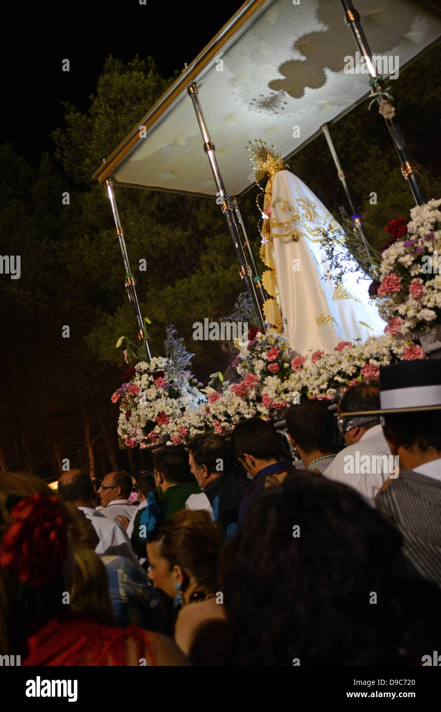 Getafe, South of Madrid, Spain. 15th June, 2013. Volunteers carry the ...