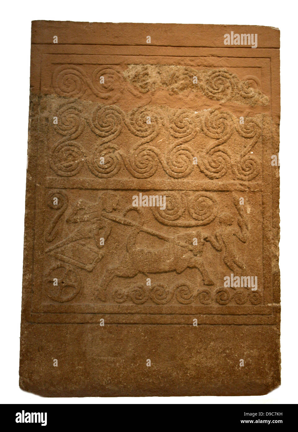 Funerary stele made of poros stone, with relief chariot scene. The ...