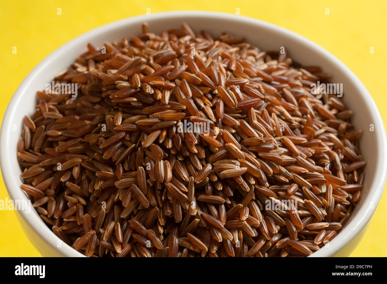 Close-up view of red whole rice Stock Photo - Alamy