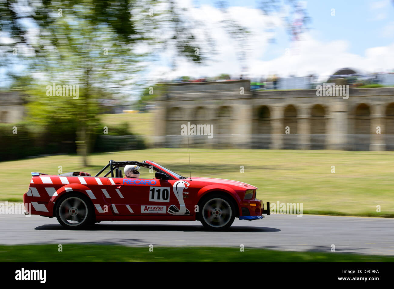 A car racing around Crystal Palace Park in London for the Motorsport at ...