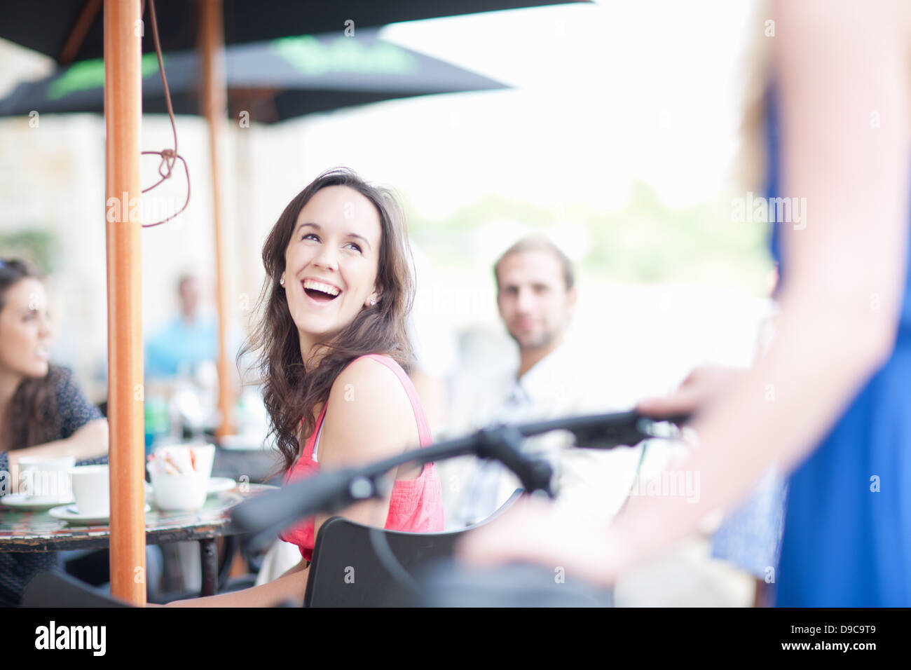 Young brunette female turning head hi-res stock photography and images ...