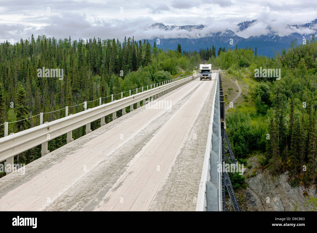 Camper crossing Kuskulana Bridge, c1910, built by Copper River ...
