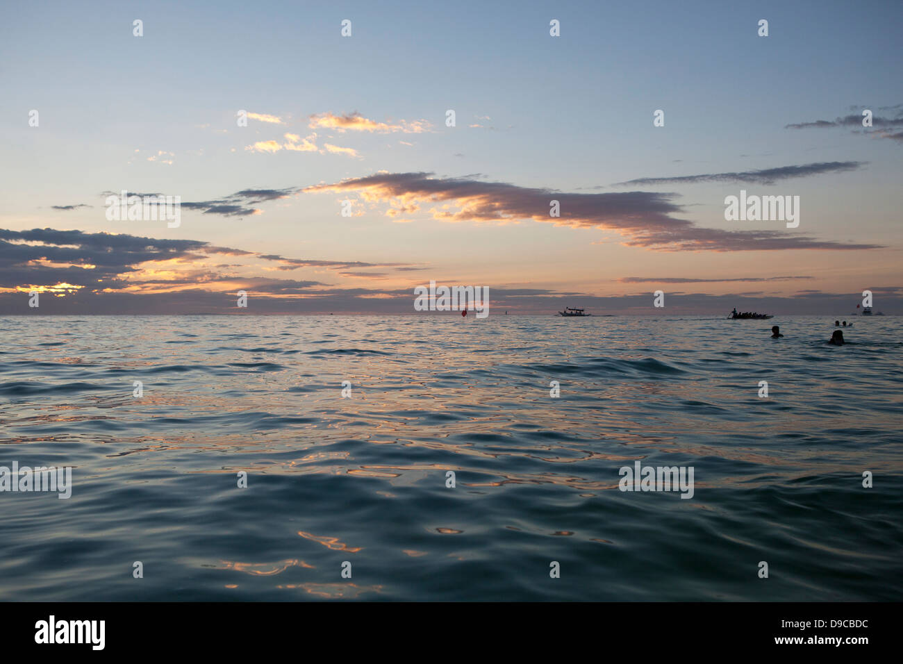 Sun setting in Boracay, Philippines Stock Photo - Alamy