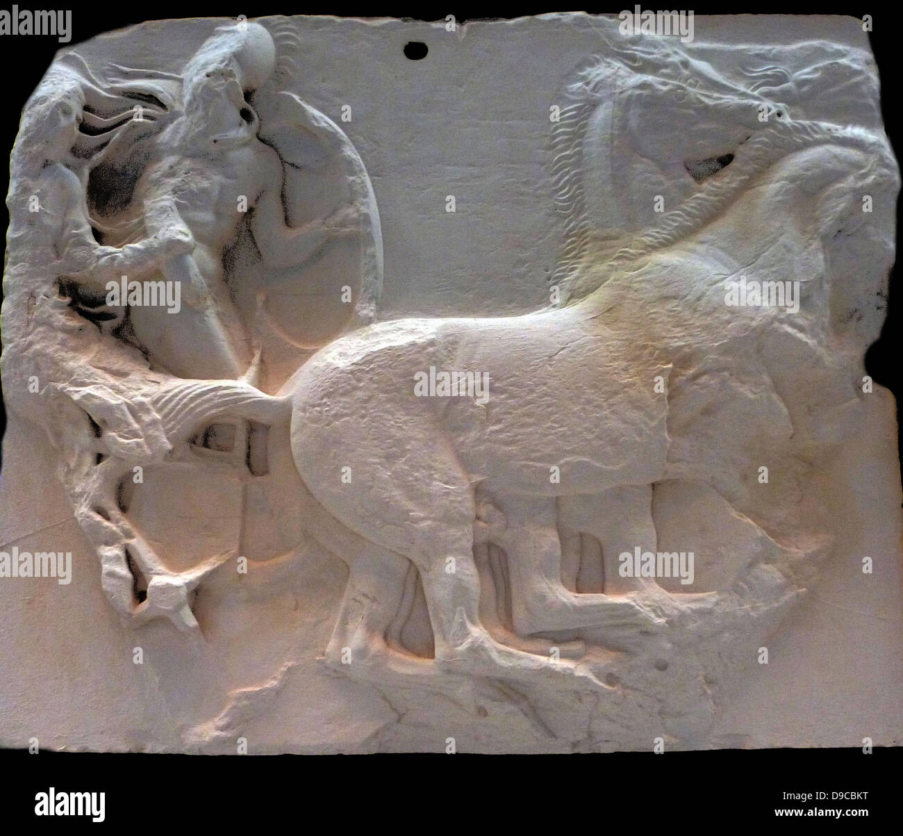 charioteer and hoplite with helmet and shield depicted in part of the ...