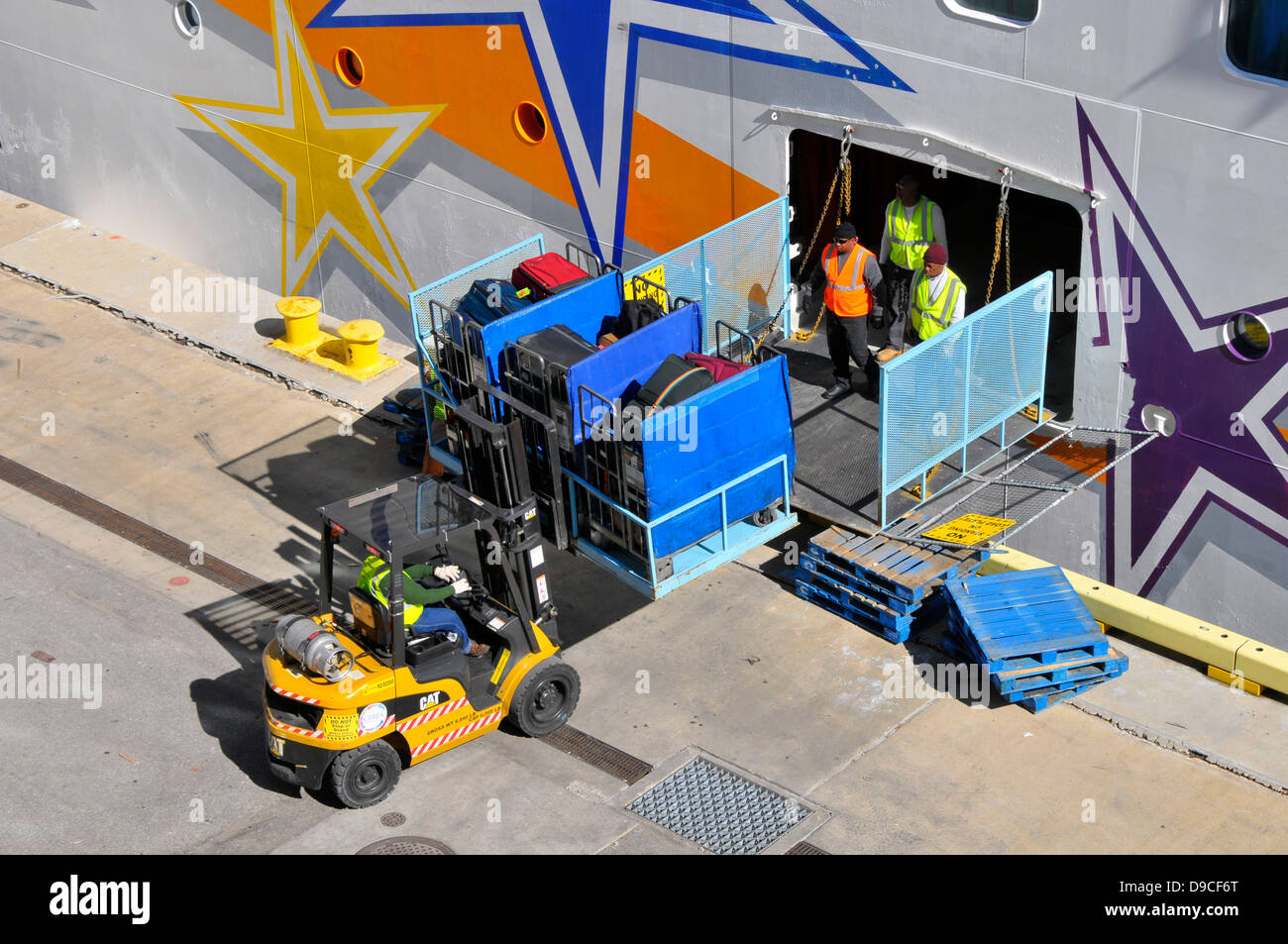 Cruise Ship being loaded with supplies and luggage in port Stock Photo ...