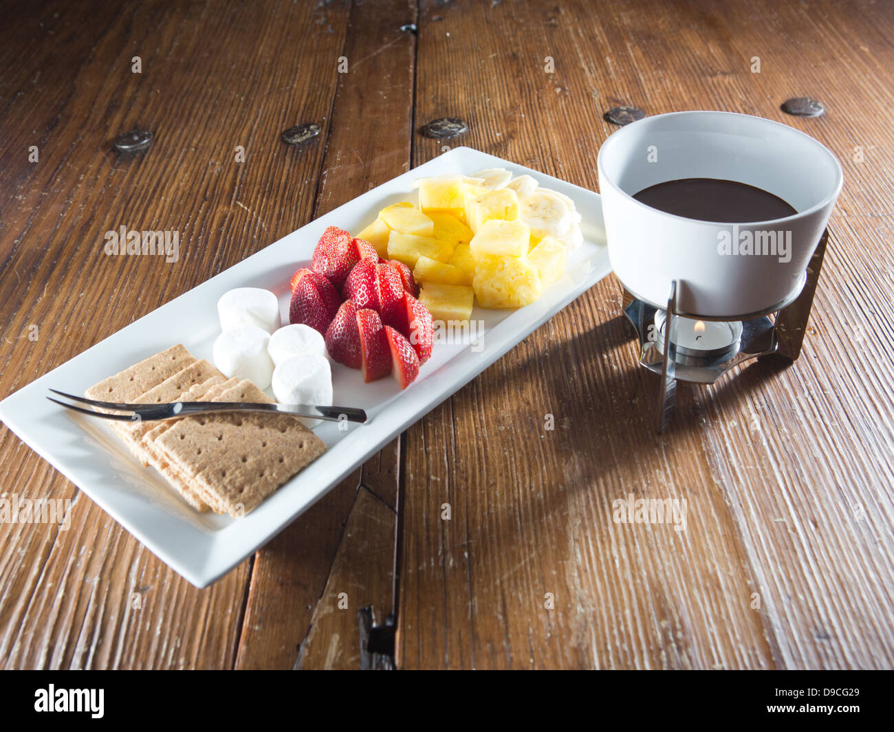 Fondue tray of strawberries, pineapple, marshmallows and graham ...
