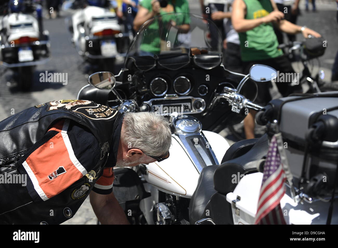 Harley Davidson Rider Enthusiasts Roll Into Rome with USA flag. The low ...