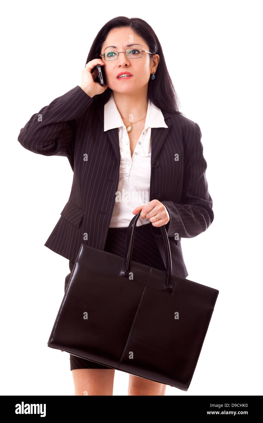 Pretty professional lady in black suit calling from cell phone Stock ...