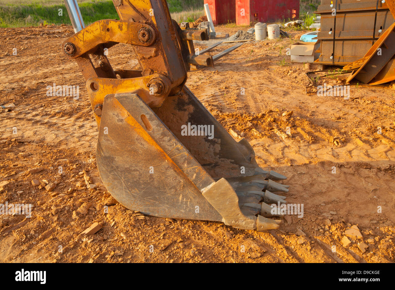 Digger at a construction site Stock Photo - Alamy