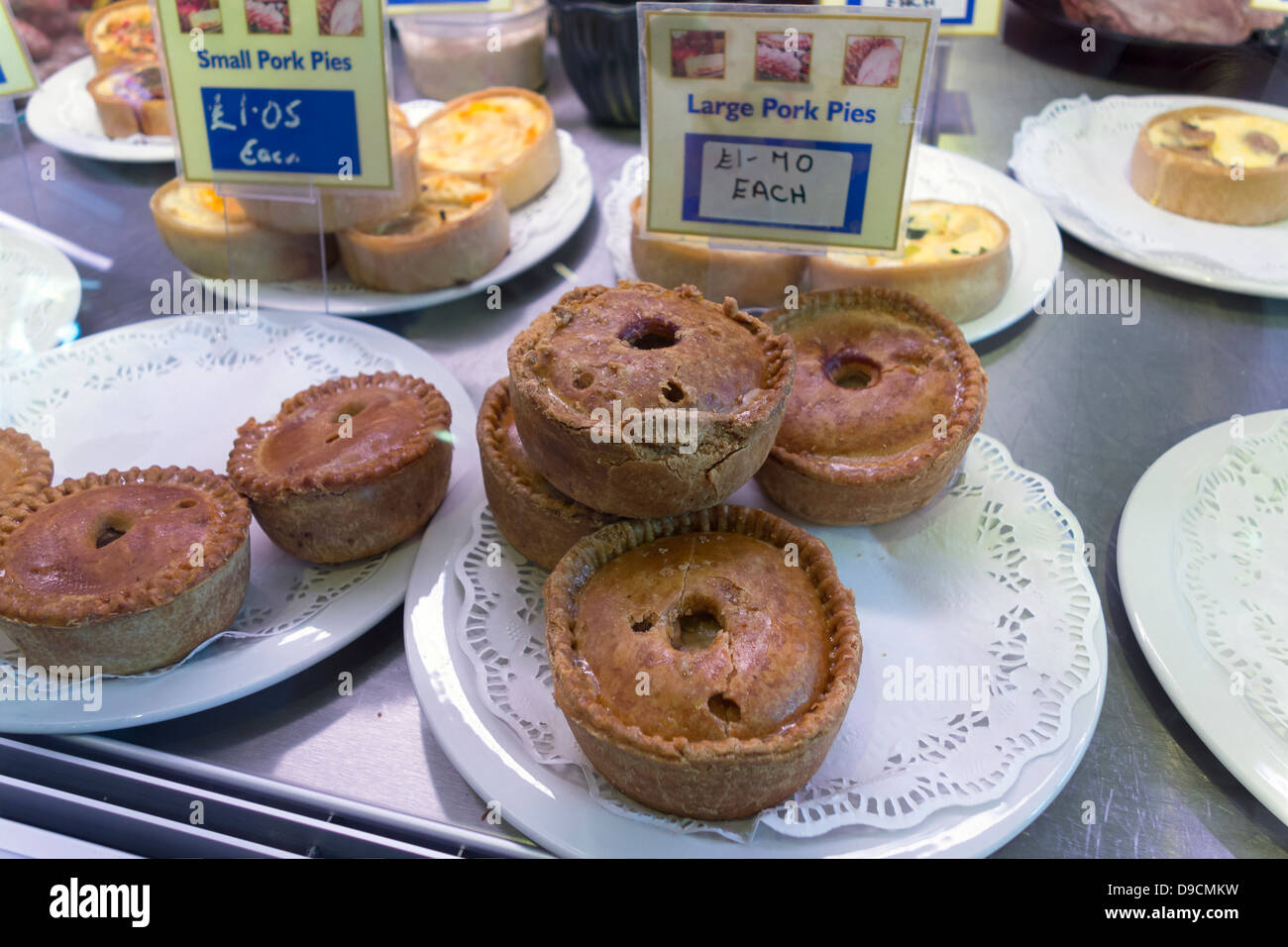 Pork pies at a deli counter at a farm shop Stock Photo - Alamy