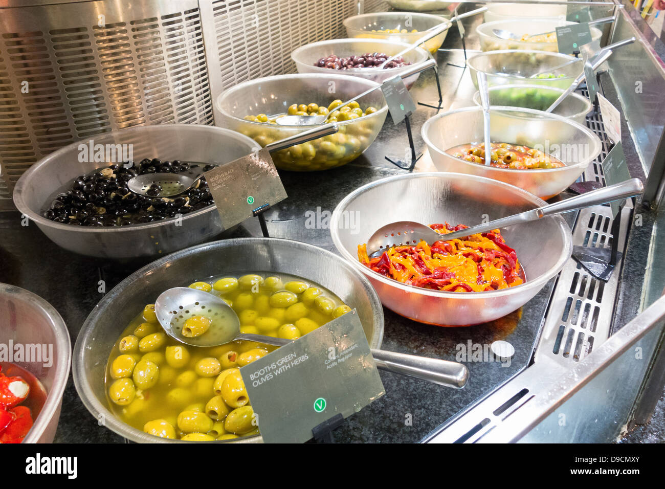 Salad counter with bowls of olives at a supermarket Stock Photo - Alamy