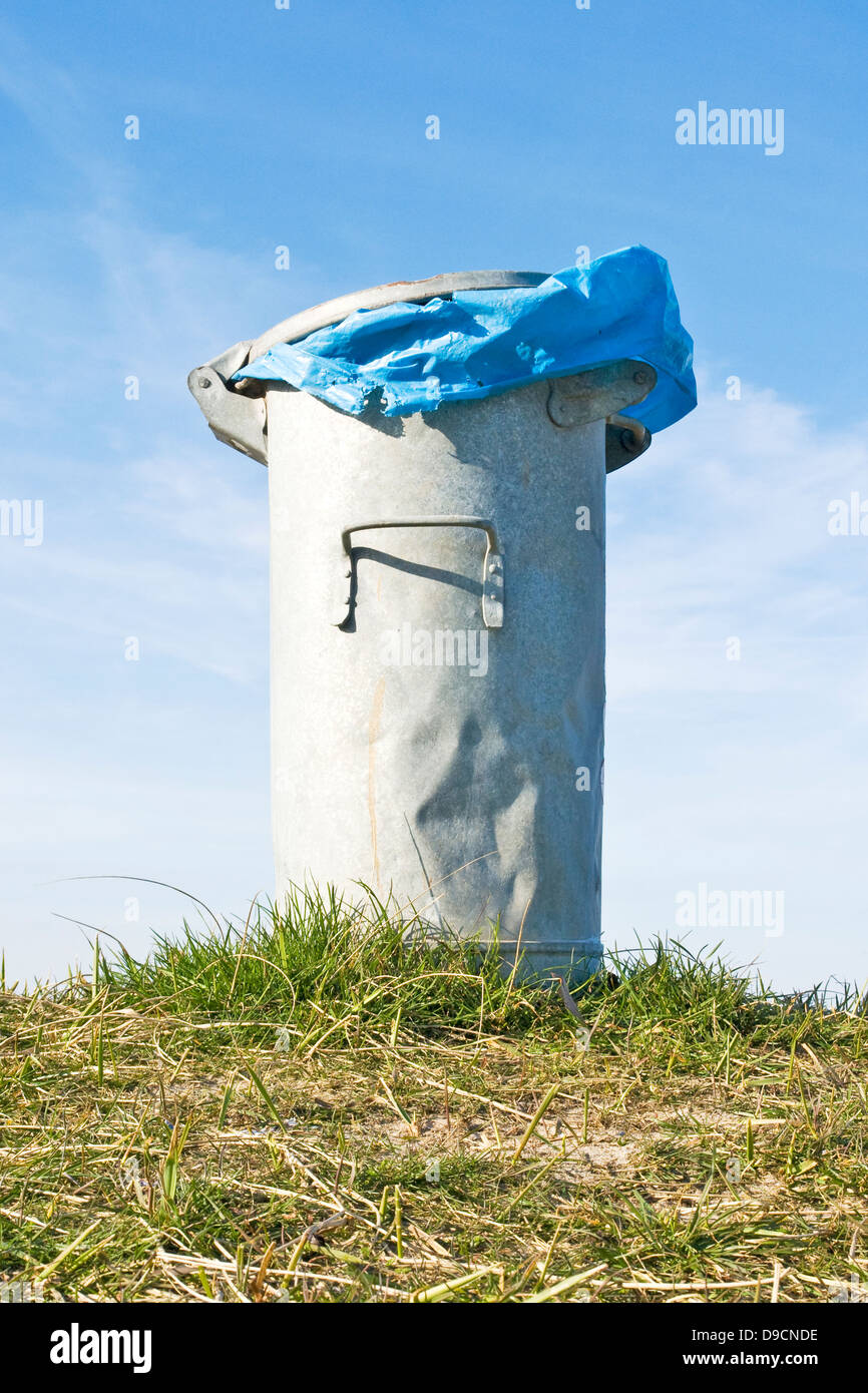 Garbage tonne on the beach, Dustbin on the beach Stock Photo - Alamy
