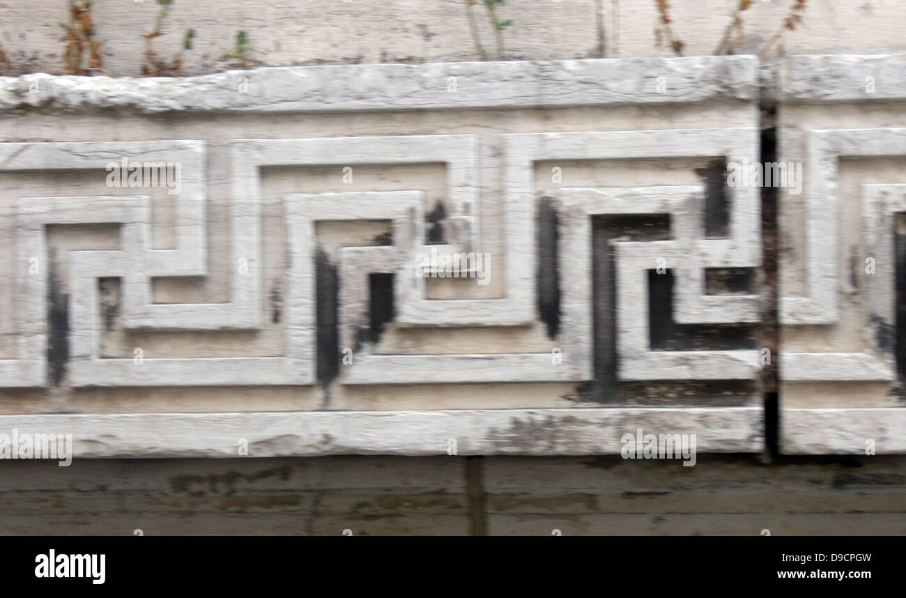 decorative Swastika type relief on the faτade of a building on a canal ...