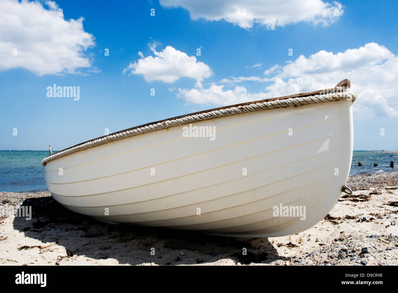 Oar boat on the Baltic beach Stock Photo - Alamy