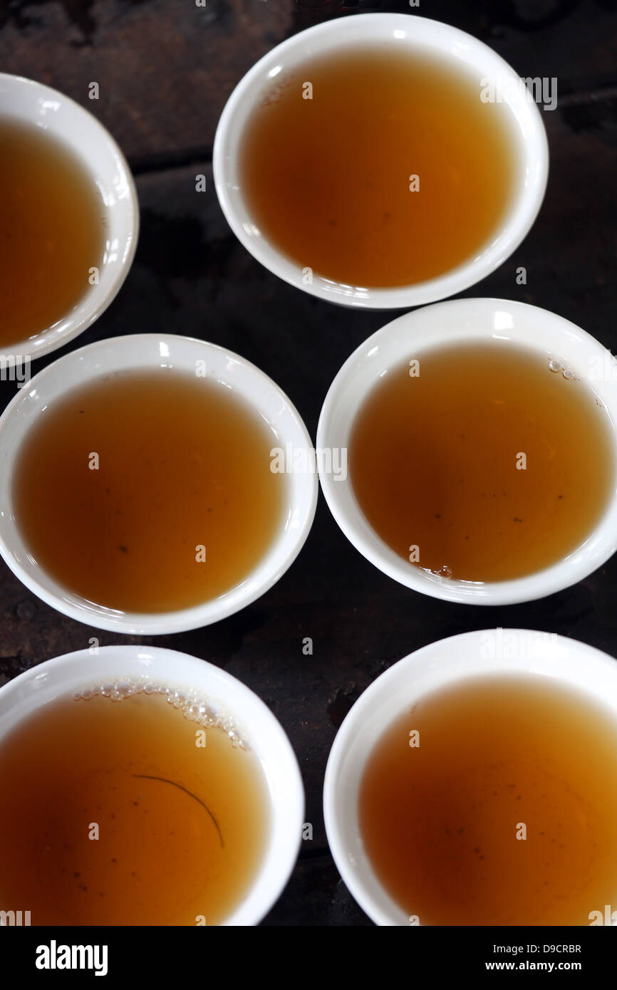 Six cups of tea in Buddhist temple on Inle Lake, Myanmar, Southeast ...