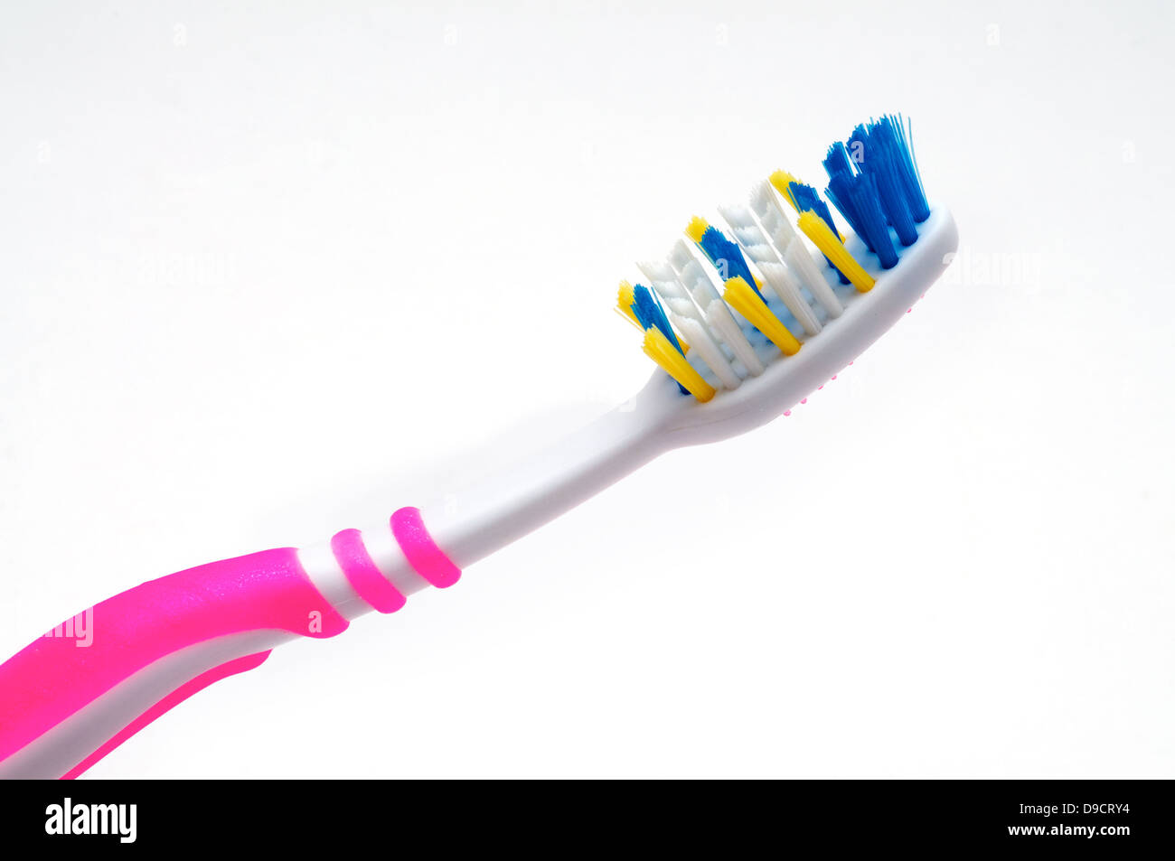 A close up of toothbrush on a white background Stock Photo - Alamy