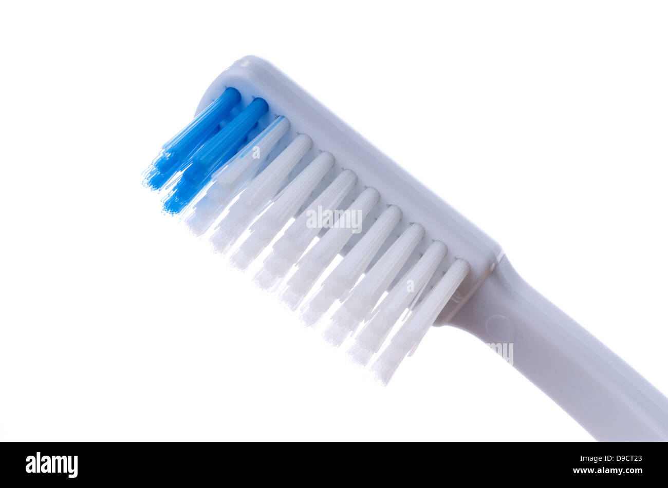 Blue toothbrush in white background Stock Photo - Alamy