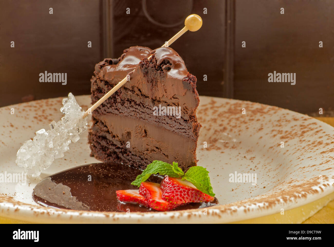 Fresh cut chocolate cake with rock candy Stock Photo - Alamy