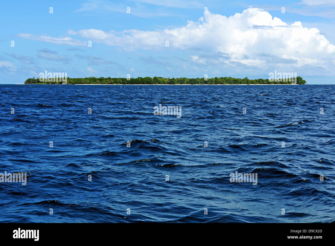 Unspoiled tropical island with lush vegetation on the horizon, Bocas ...