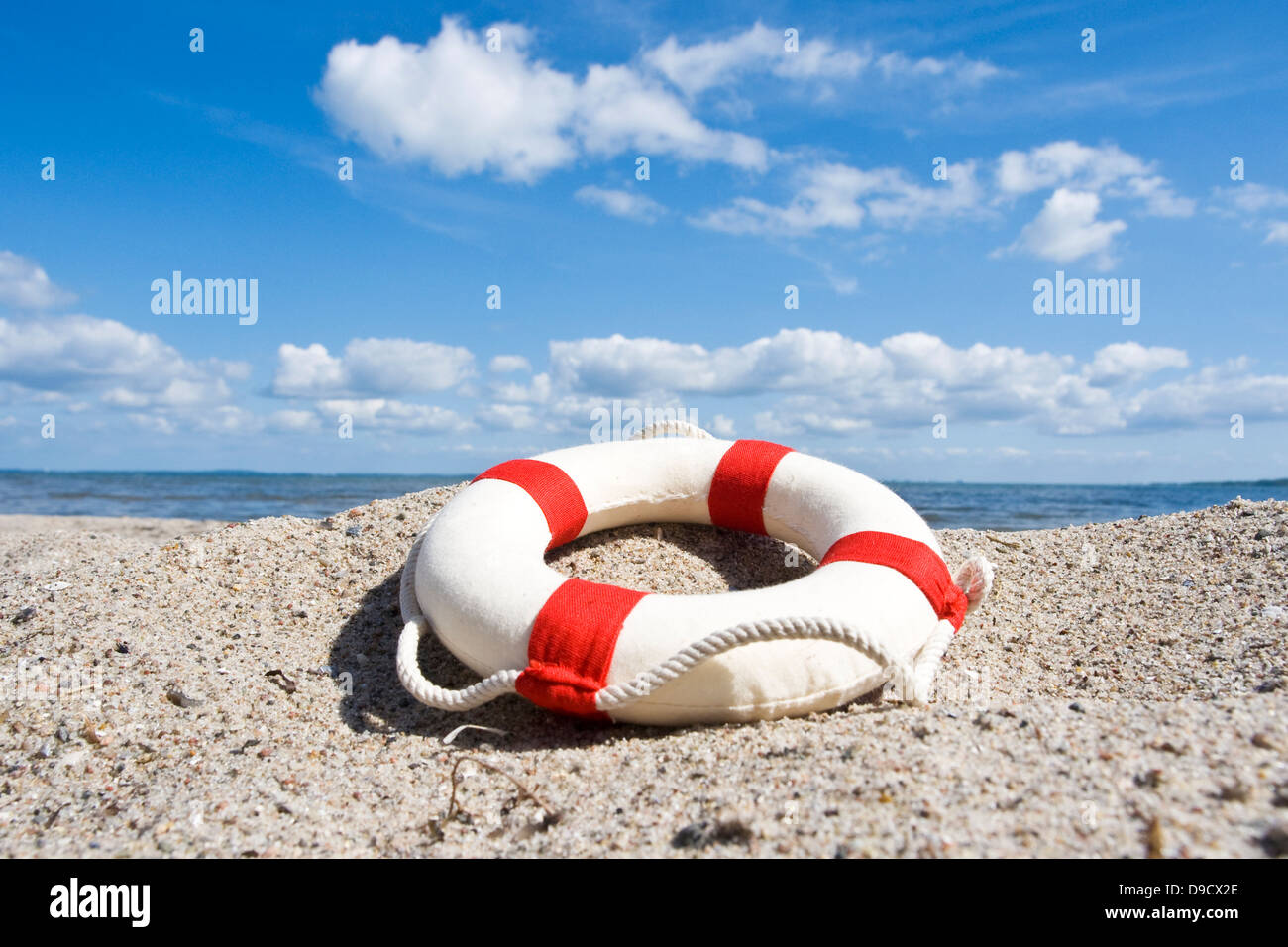Life preserver on the beach Stock Photo - Alamy