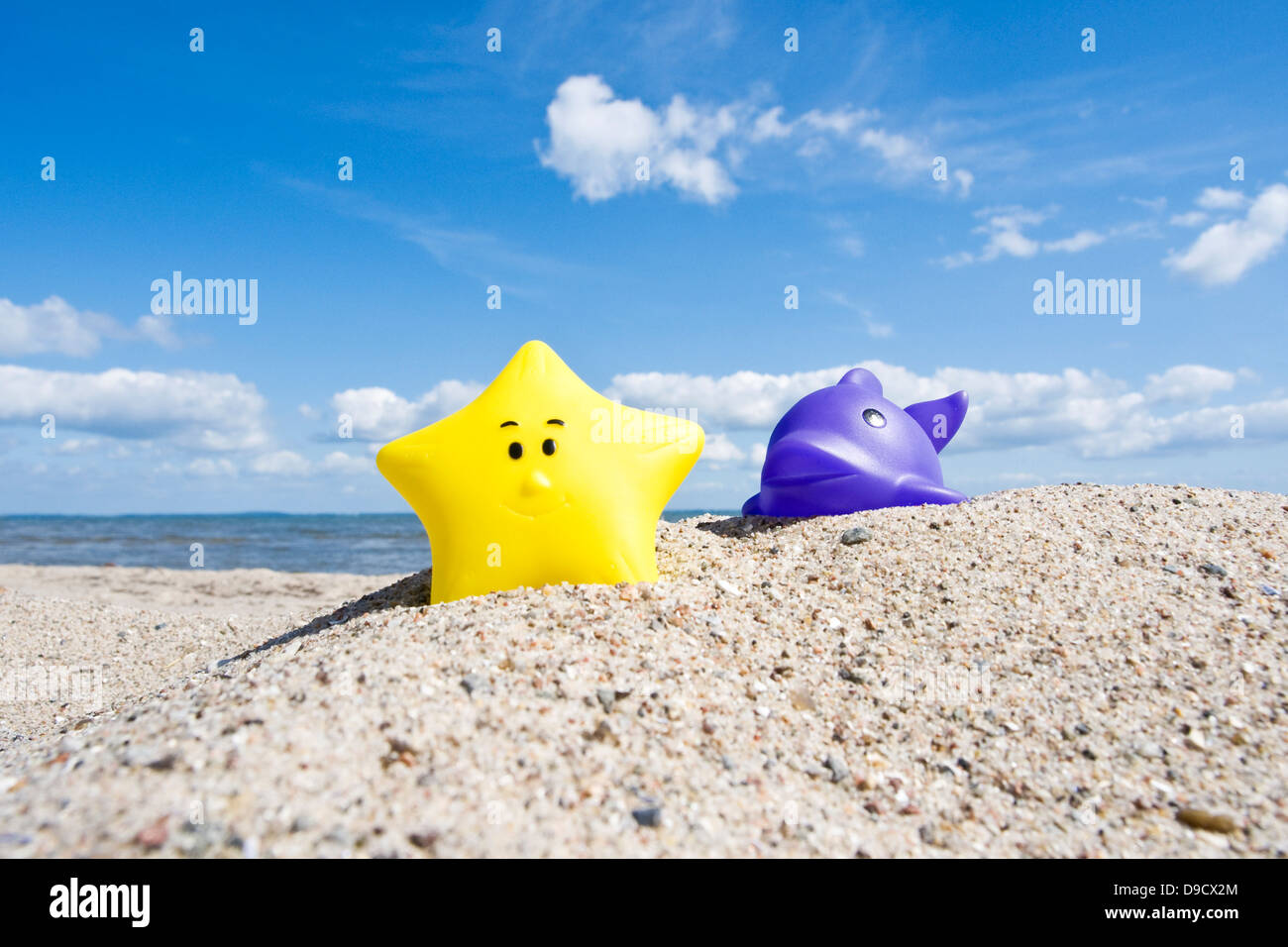 Elastic animals on the beach Stock Photo - Alamy