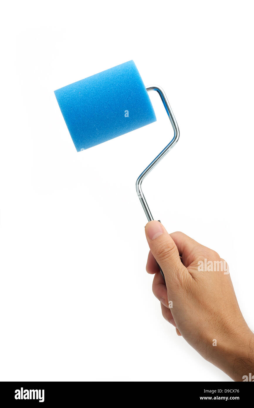 Hand holding a blue paint roller on white background Stock Photo - Alamy