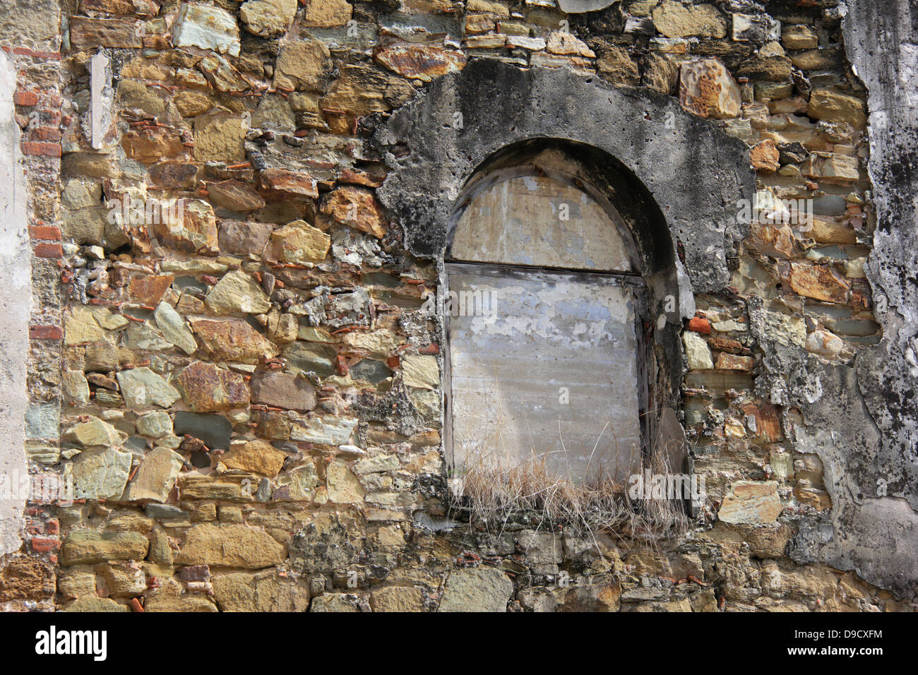Old closed window arch on a colonial wall Stock Photo - Alamy