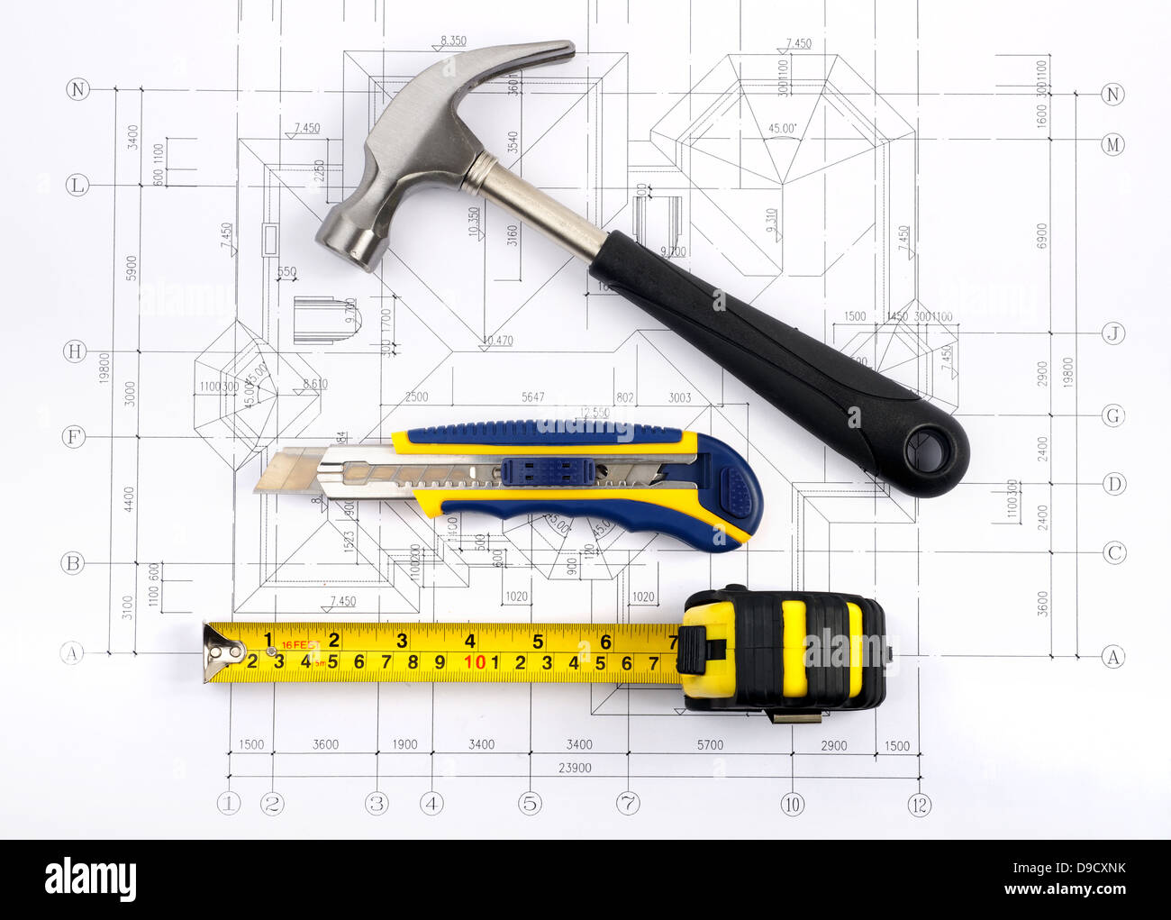 Various home tools on blueprint Stock Photo - Alamy