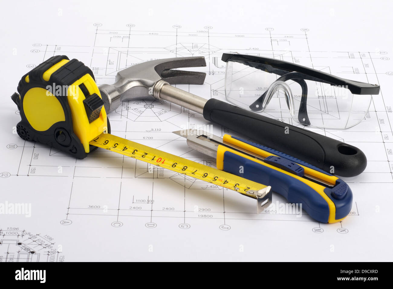 Various home tools on blueprint as home construction concept Stock ...