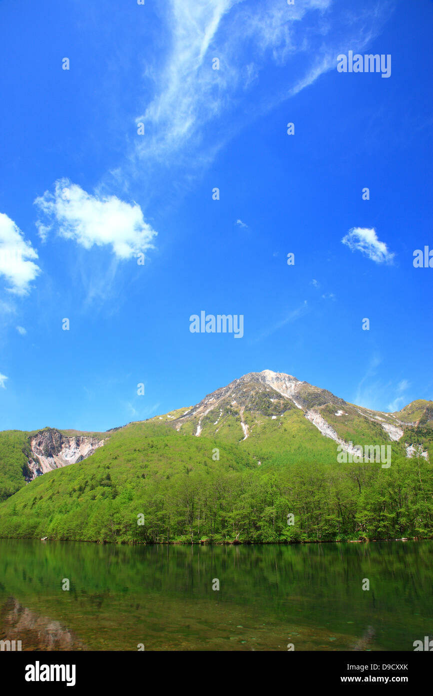 Yakedake mountain range and Taisho pond, Nagano Prefecture Stock Photo ...