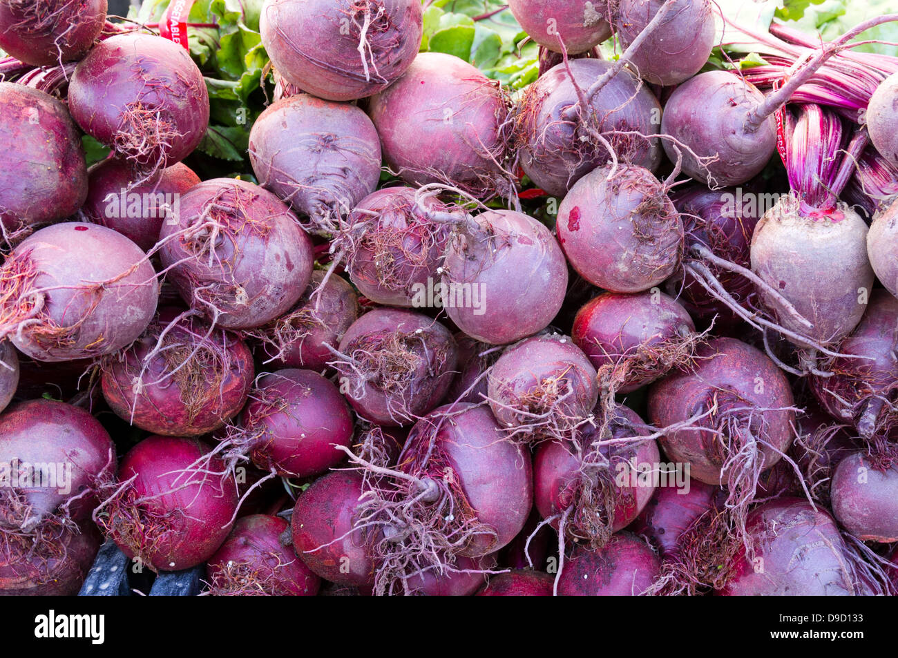 Beets on display at the farmers market Stock Photo - Alamy