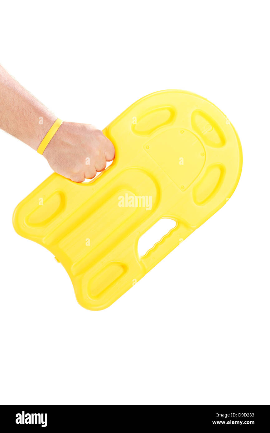 Male hand holding a yellow swimming float Stock Photo - Alamy