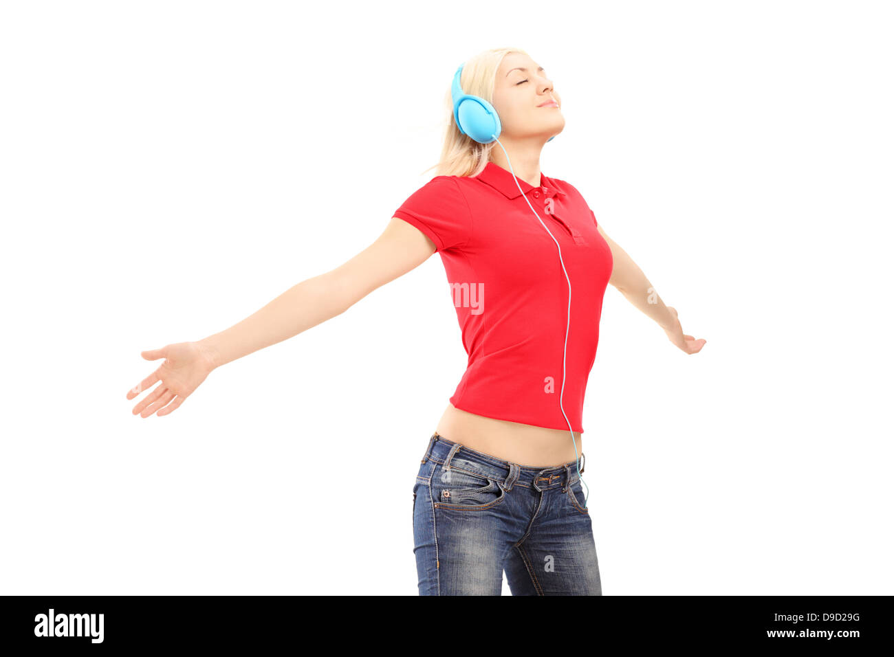 Woman with headphones listening to music and enjoying Stock Photo - Alamy