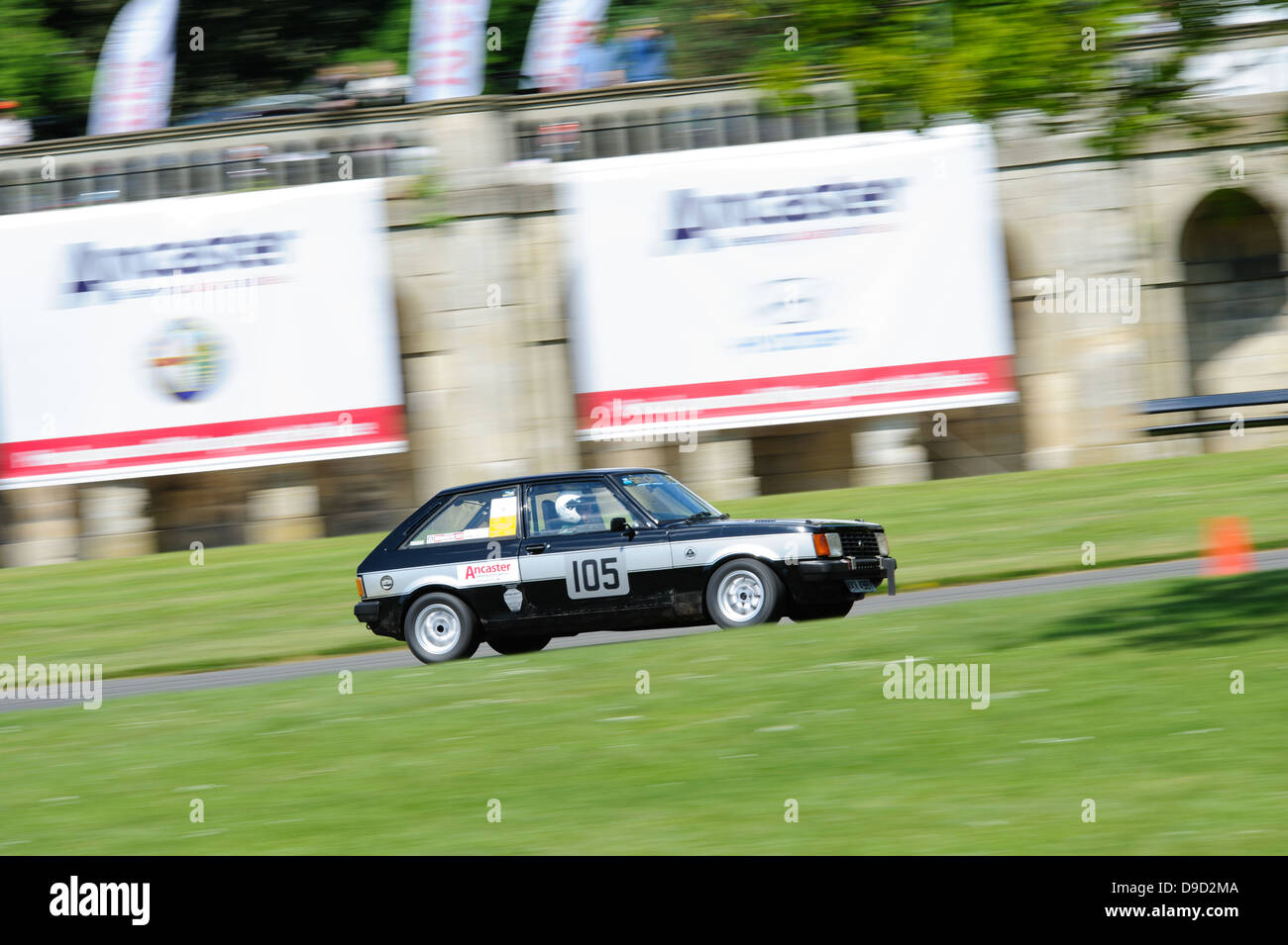 A car racing around Crystal Palace Park in London for the Motorsport at ...