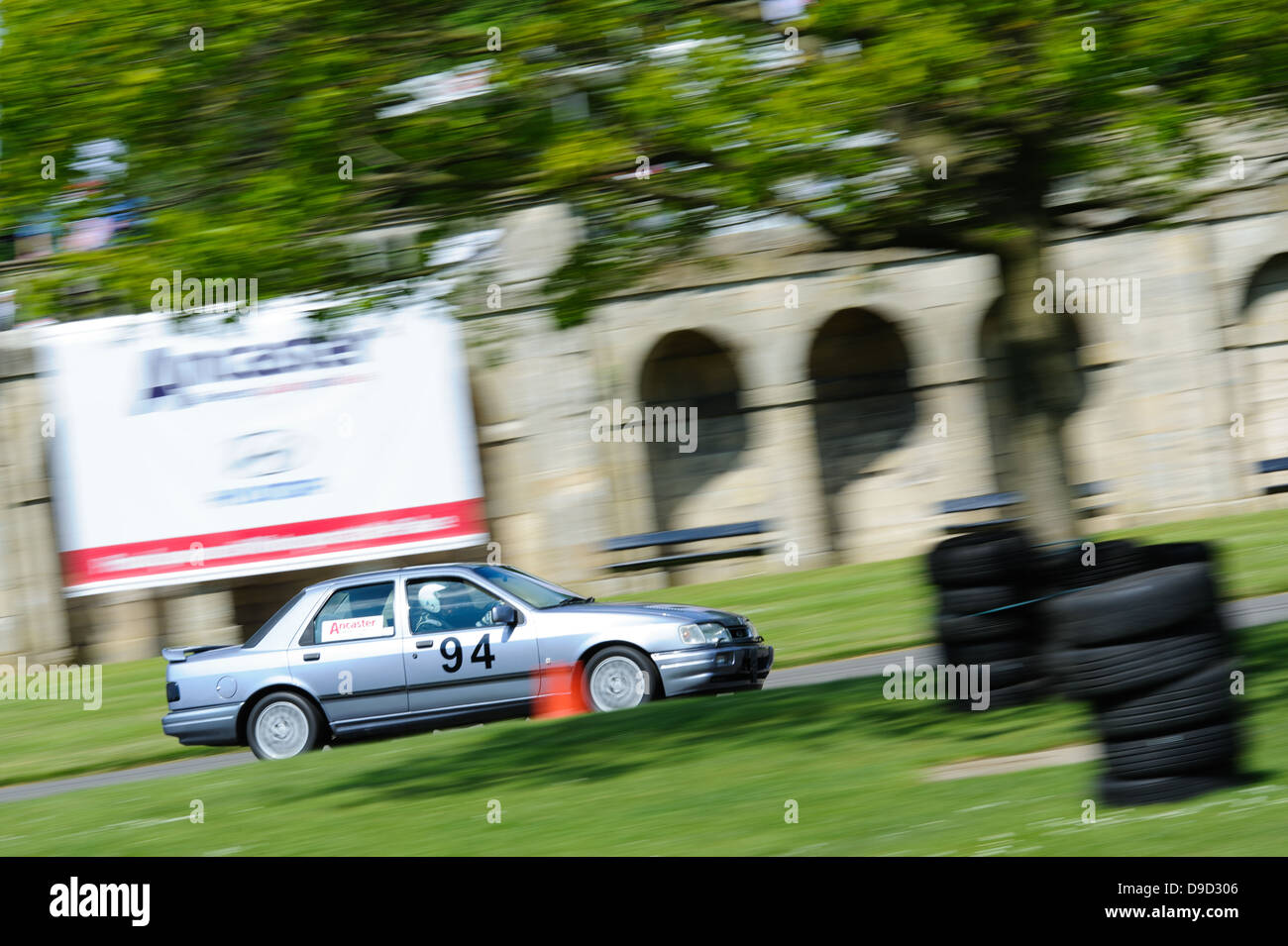 A car racing around Crystal Palace Park in London for the Motorsport at ...