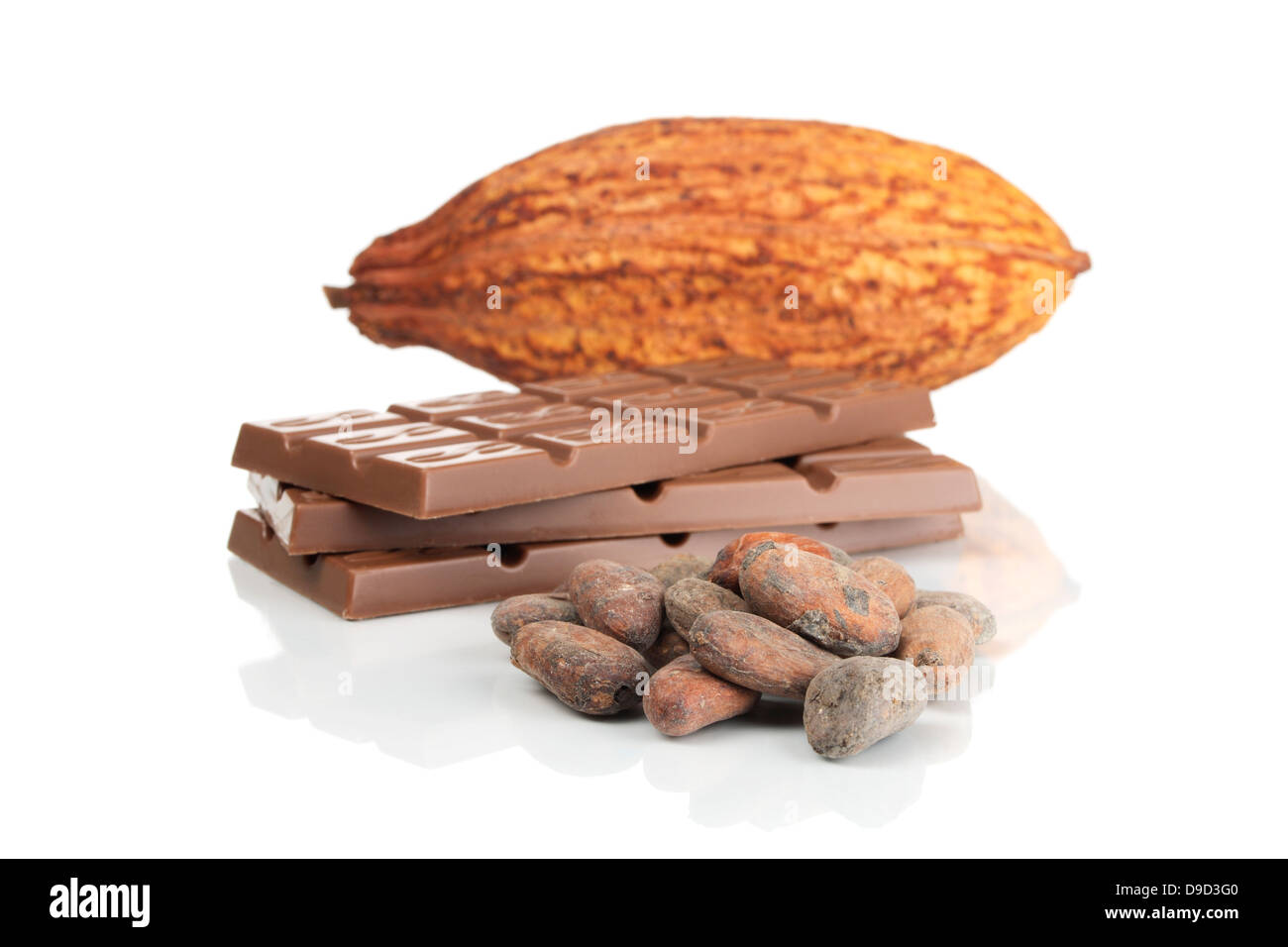 Milk chocolate with cacao beans Stock Photo - Alamy