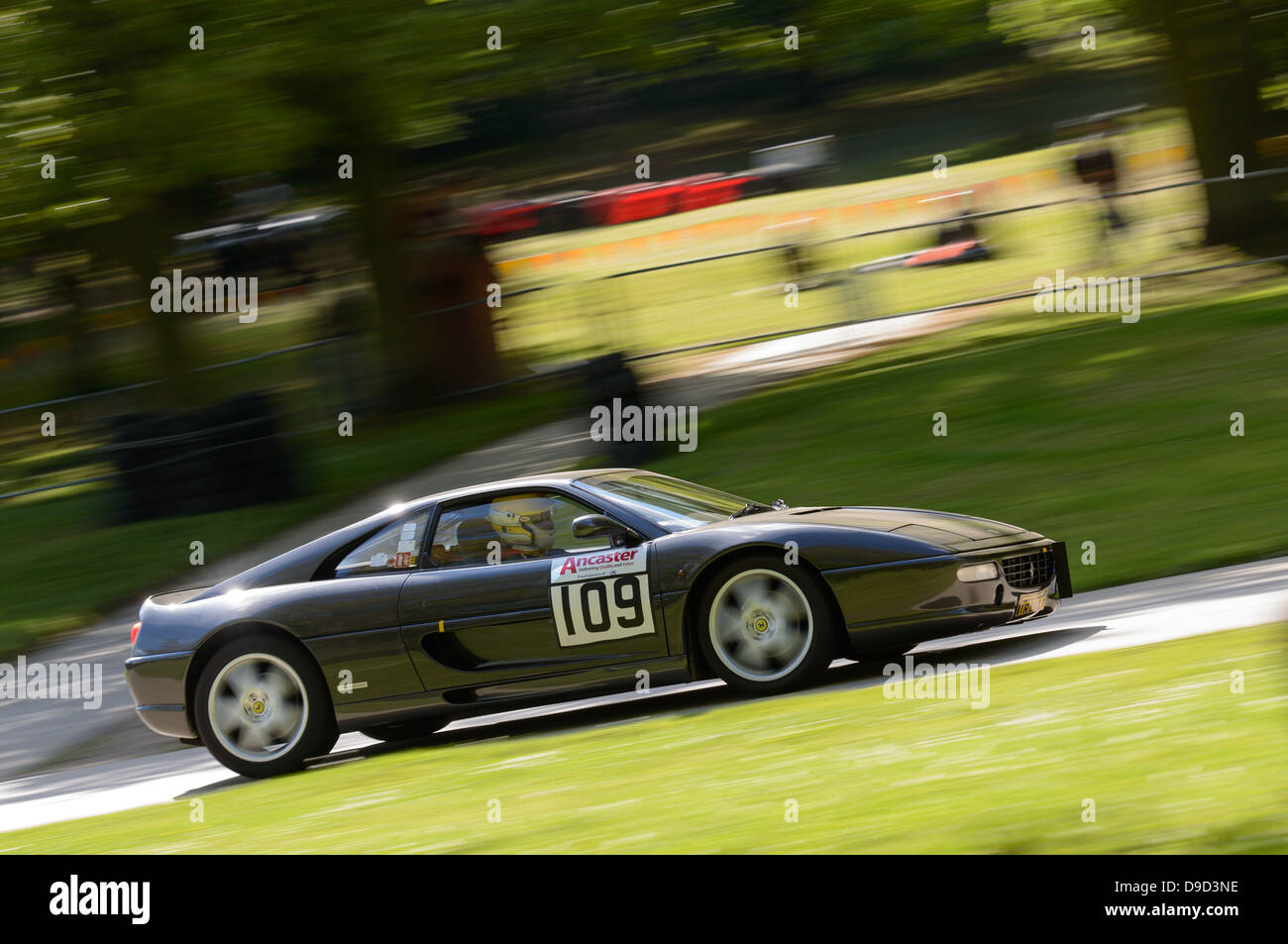A car racing around Crystal Palace Park in London for the Motorsport at ...