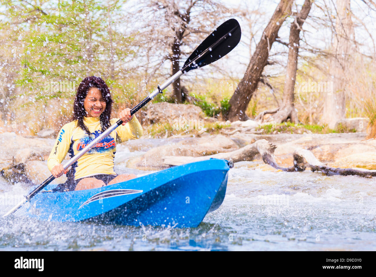 USA, Texas, Young woman kayaking on Frio River, smiling Stock Photo - Alamy