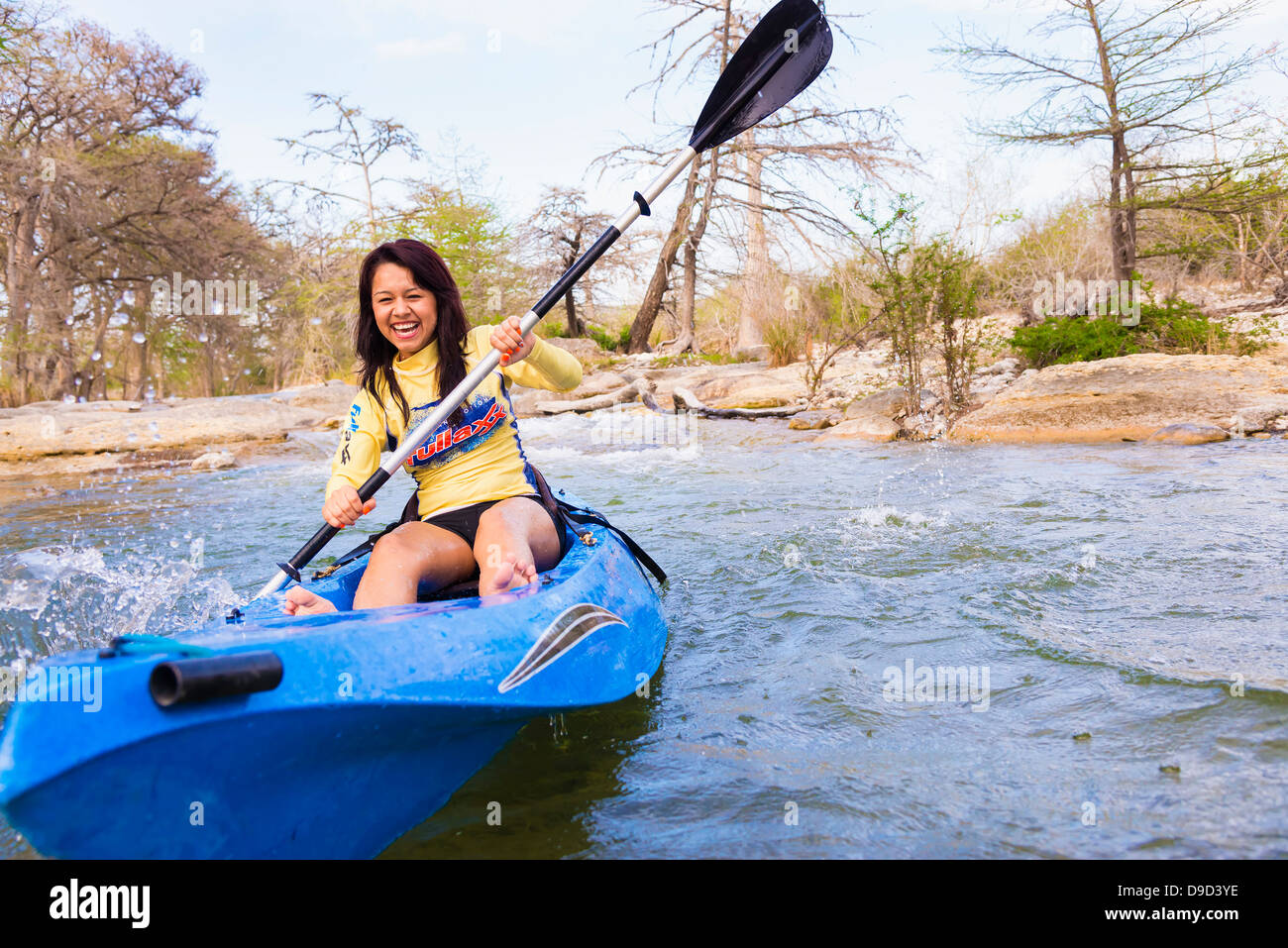 USA, Texas, Young woman kayaking on Frio River, smiling Stock Photo - Alamy