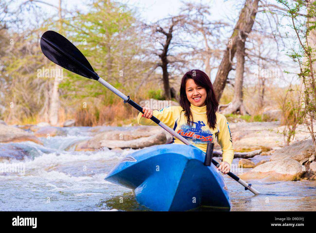 USA, Texas, Young woman kayaking on Frio River, smiling Stock Photo - Alamy