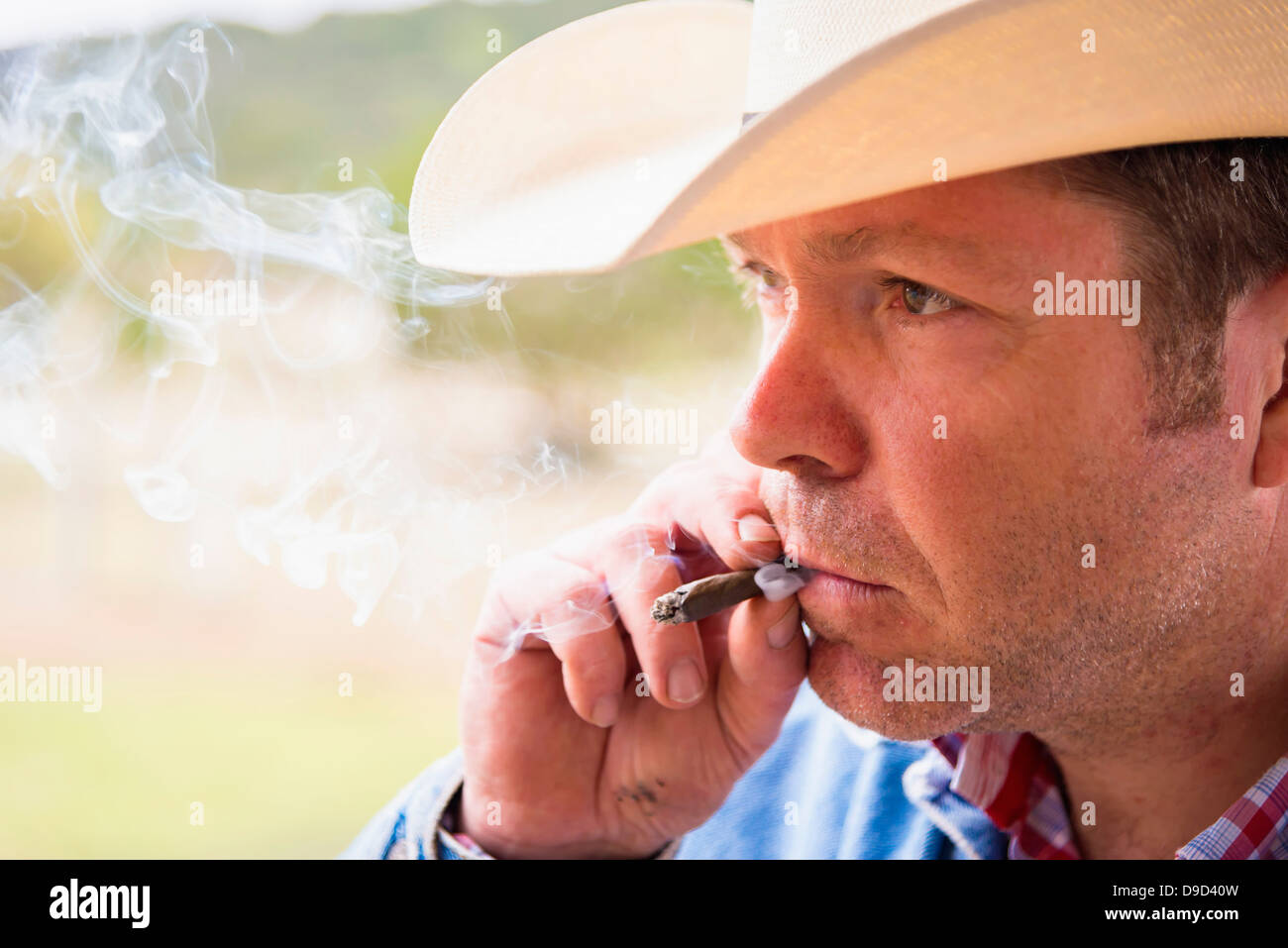 Cowboy smoking hi-res stock photography and images - Alamy