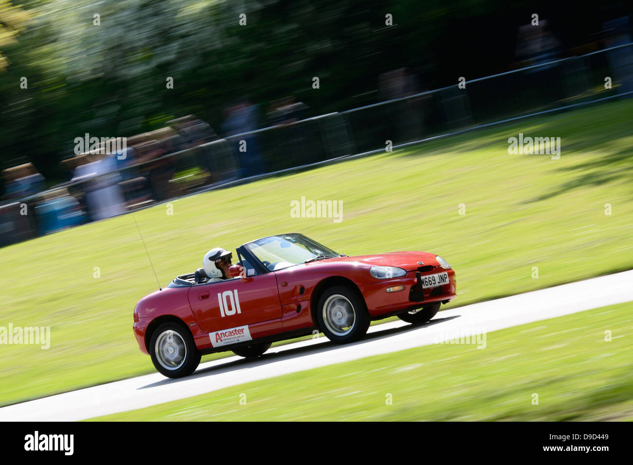 A car racing around Crystal Palace Park in London for the Motorsport at ...