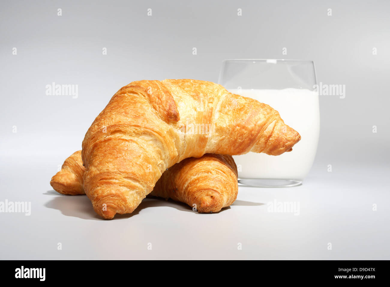 Croissants with fresh milk Stock Photo - Alamy
