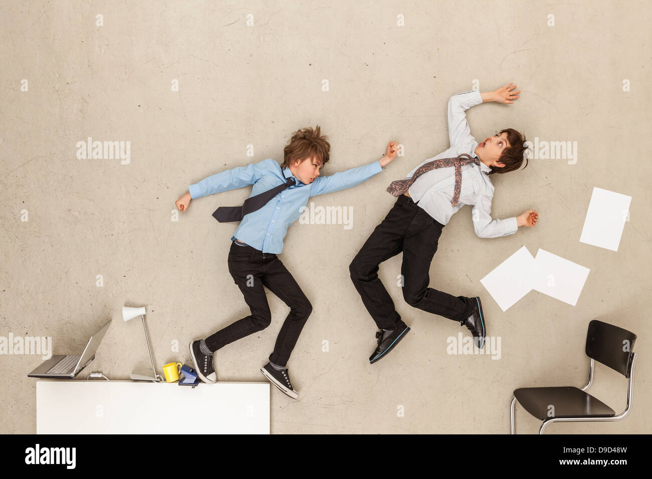 Business boys fighting in office Stock Photo - Alamy
