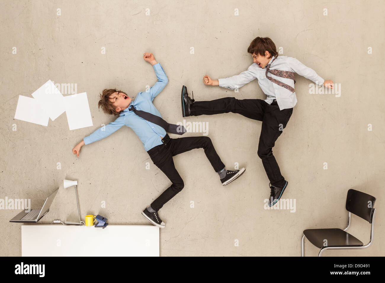 Business boys fighting in office Stock Photo - Alamy